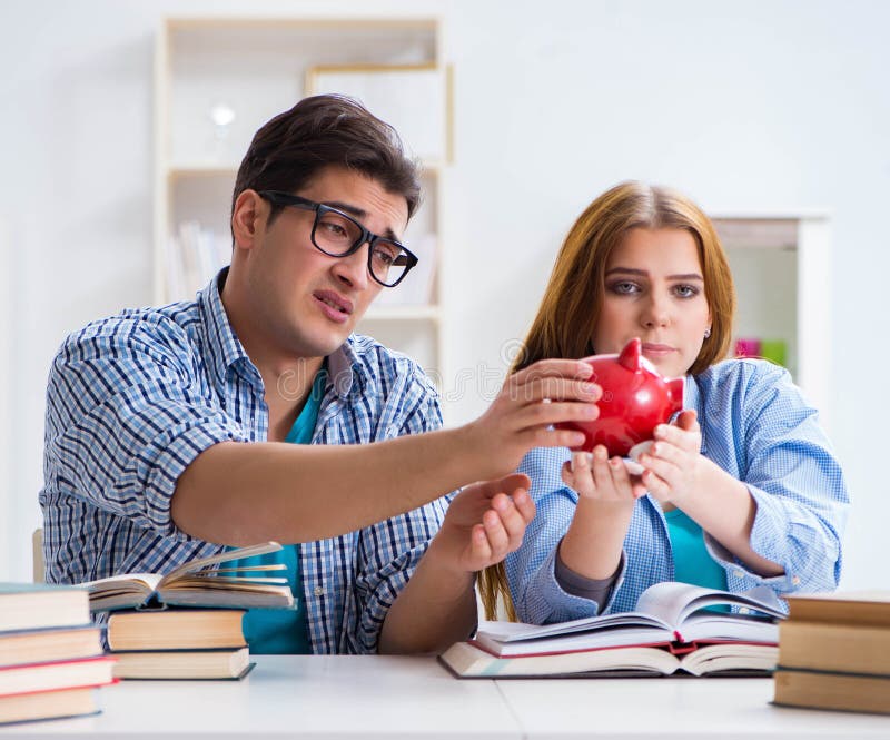 Two Students Checking Savings To Pay for Education Stock Image - Image ...