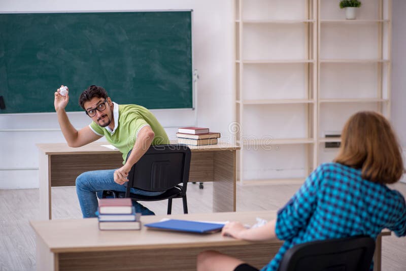 Two Students Having Fun in the Classroom Stock Image - Image of school ...