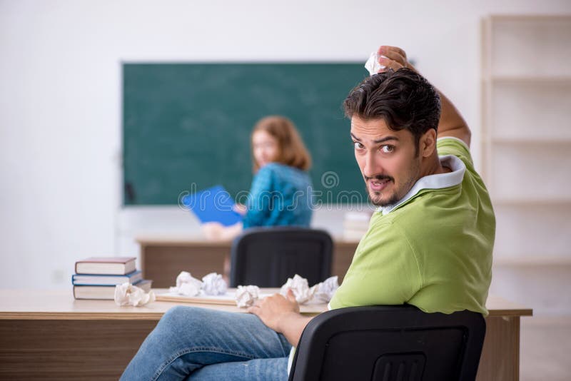Two Students Having Fun in the Classroom Stock Photo - Image of view ...