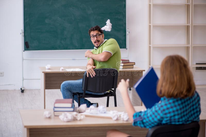 Two Students Having Fun in the Classroom Stock Photo - Image of exam ...
