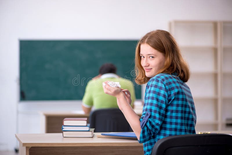 Two Students Having Fun in the Classroom Stock Photo - Image of ...