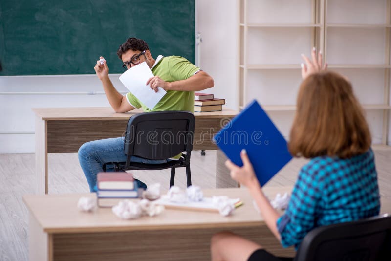 Two Students Having Fun in the Classroom Stock Image - Image of ...