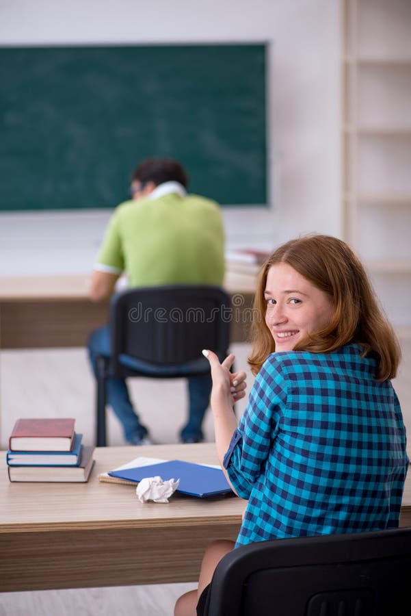 Two Students Having Fun in the Classroom Stock Image - Image of ...