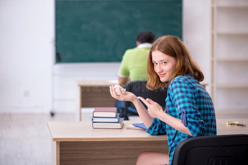 Two Students Having Fun in the Classroom Stock Image - Image of creased ...