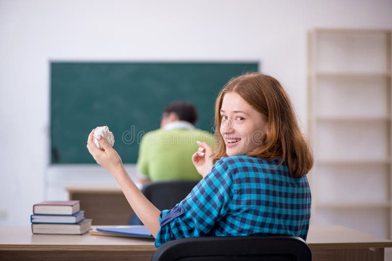 Two Students Having Fun in the Classroom Stock Photo - Image of male ...