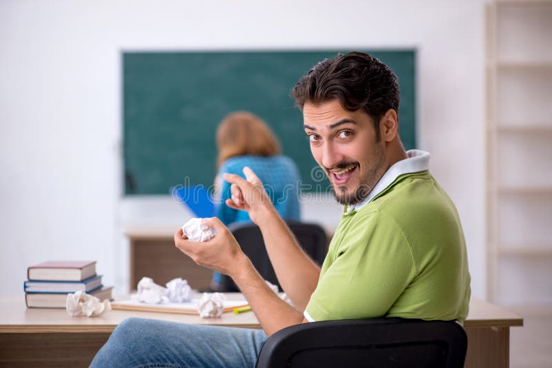 Two Students Having Fun in the Classroom Stock Image - Image of youth ...