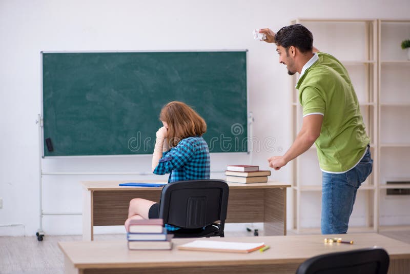 Two Students Having Fun in the Classroom Stock Image - Image of bullied ...