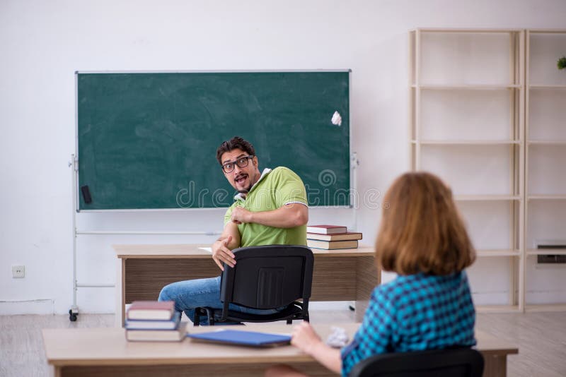 Two Students Having Fun in the Classroom Stock Image - Image of student ...