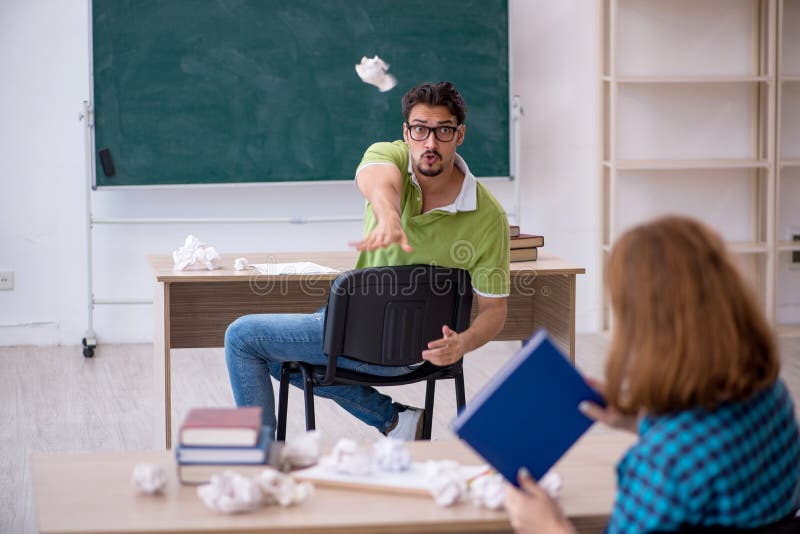 Two Students Having Fun in the Classroom Stock Image - Image of ...