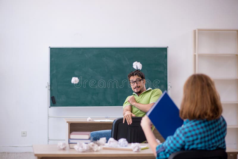 Two Students Having Fun in the Classroom Stock Image - Image of college ...