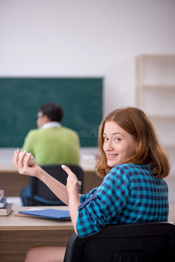 Two Students Having Fun in the Classroom Stock Image - Image of ...