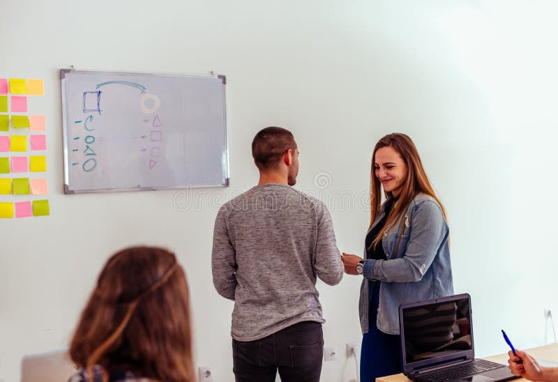 Two Students Having a Presentation Stock Photo - Image of meeting ...