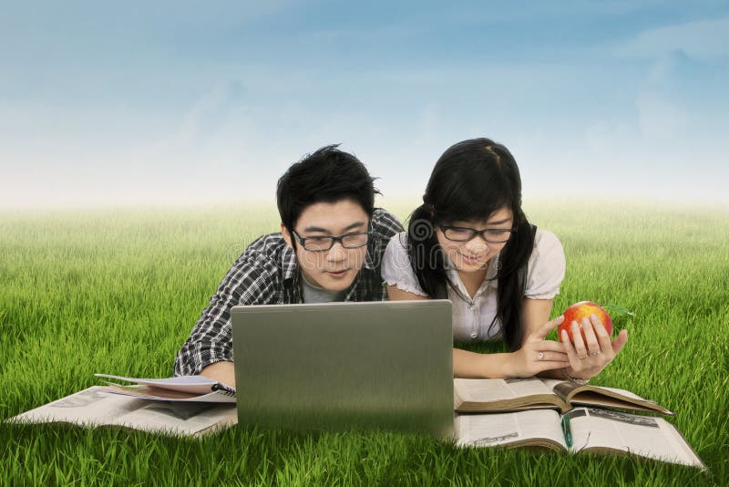Students with Laptop at Schoolyard Stock Image - Image of indian, field ...