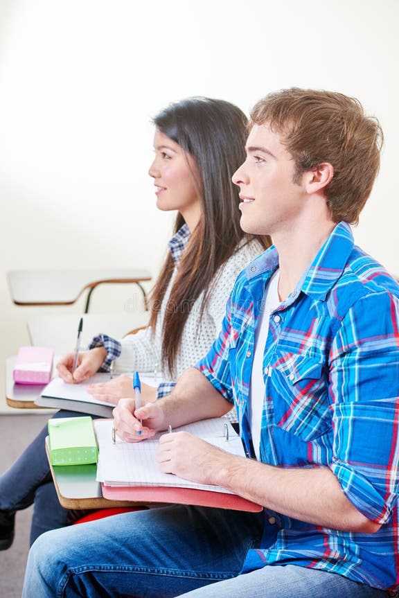 Two Students Learning in Class Stock Image - Image of notes, university ...