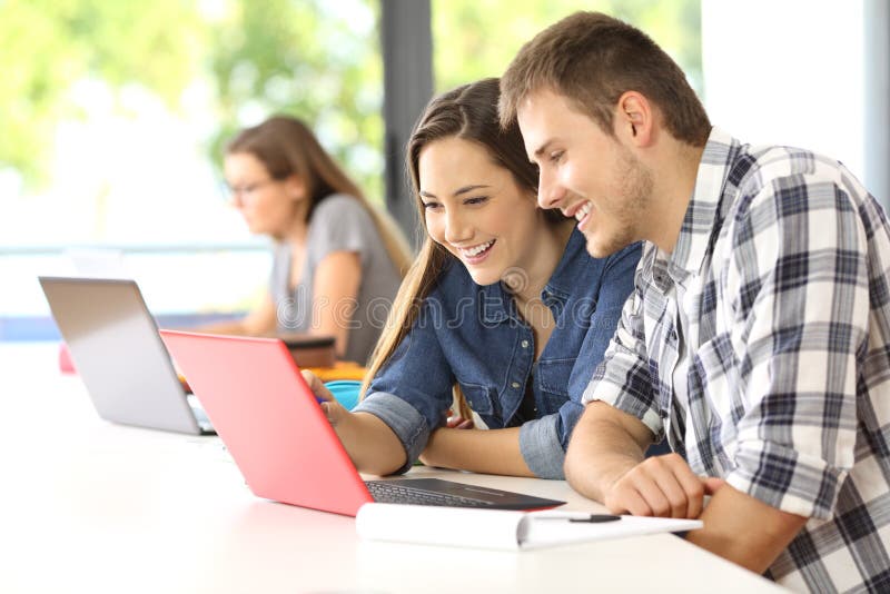 Students Learning Together on Line in a Classroom Stock Photo - Image ...