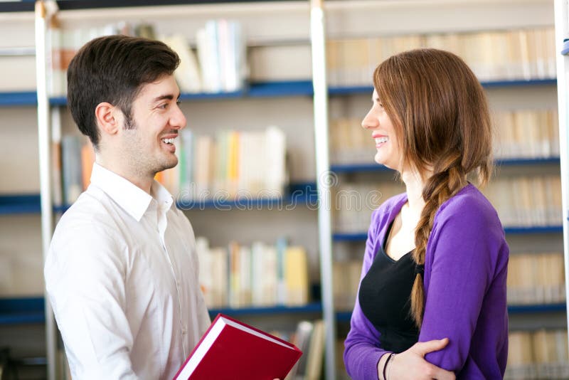 Students in a library stock photo. Image of shelf, people - 29838002