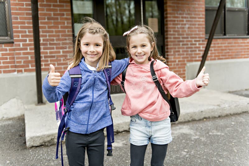 Two Students Outside at School Standing Together Stock Photo - Image of ...