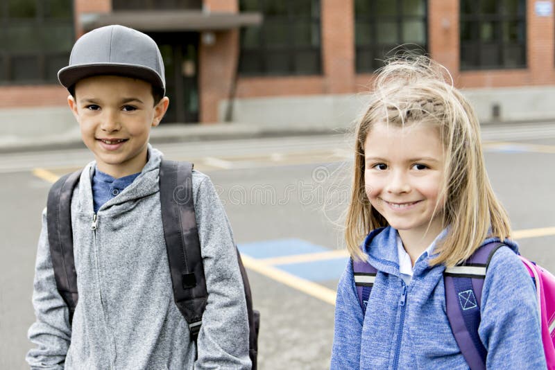 Two Students Outside at School Standing Together Stock Image - Image of ...