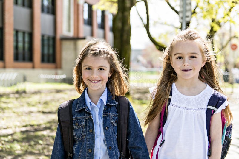 Two Students Outside at School Standing Together Stock Image - Image of ...