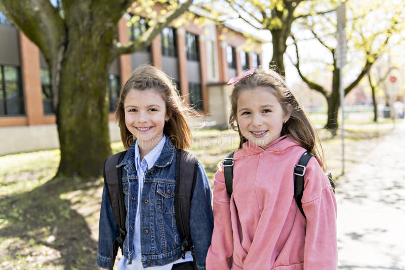 Two Students Outside at School Standing Together Stock Image - Image of ...