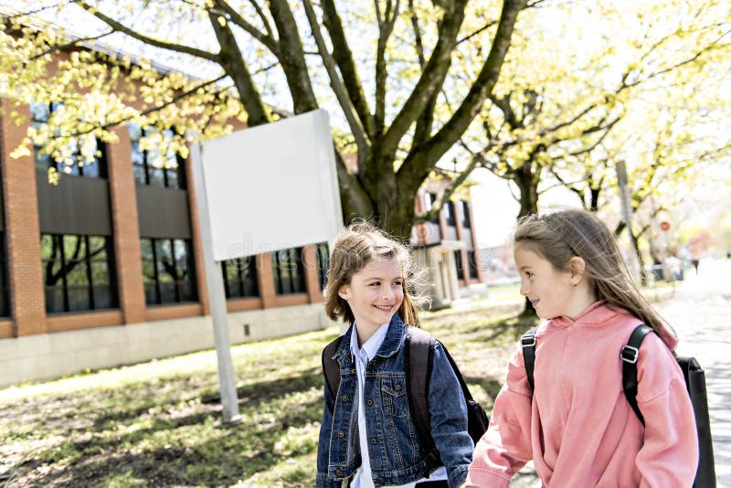 Two Students Outside at School Standing Together Stock Image - Image of ...