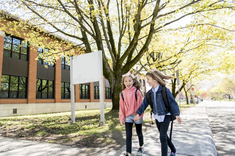 Two Students Outside at School Standing Together Stock Photo - Image of ...