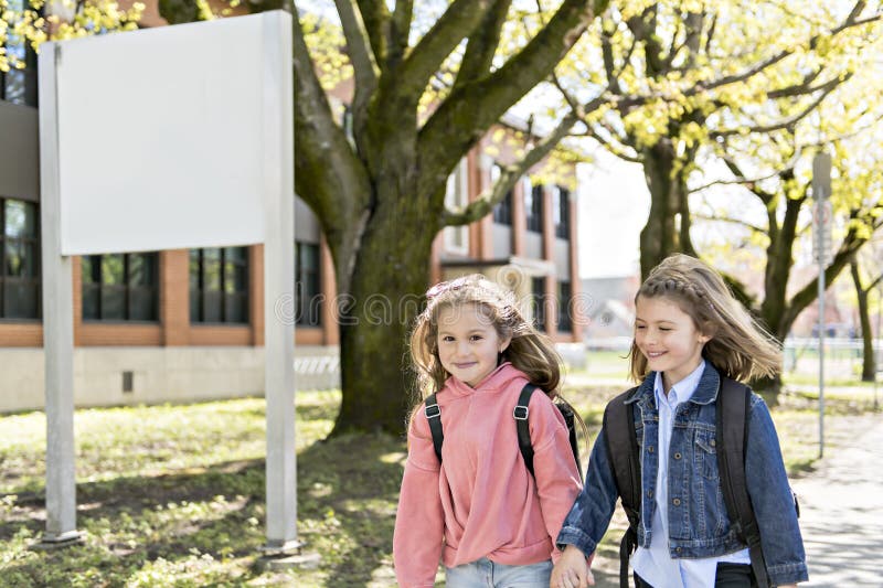 Two Students Outside at School Standing Together Stock Image - Image of ...