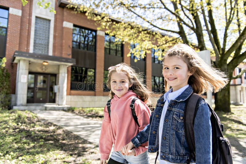 Two Students Outside at School Standing Together Stock Photo - Image of ...