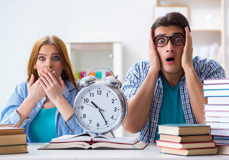 Two Students Runnng Out of Time To Prepare for Exams Stock Photo ...