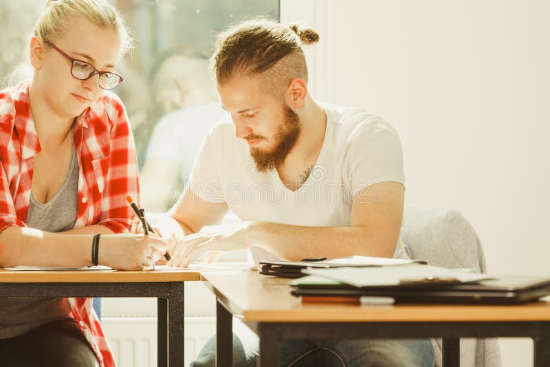 Two students in class stock photo. Image of creative - 101943610