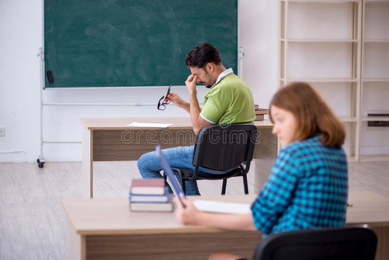 Two Students Sitting in the Classroom Stock Photo - Image of education ...