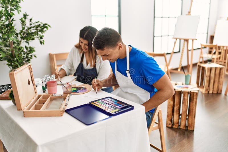 Two Students Smiling Happy Painting Sitting on the Table at Art School ...