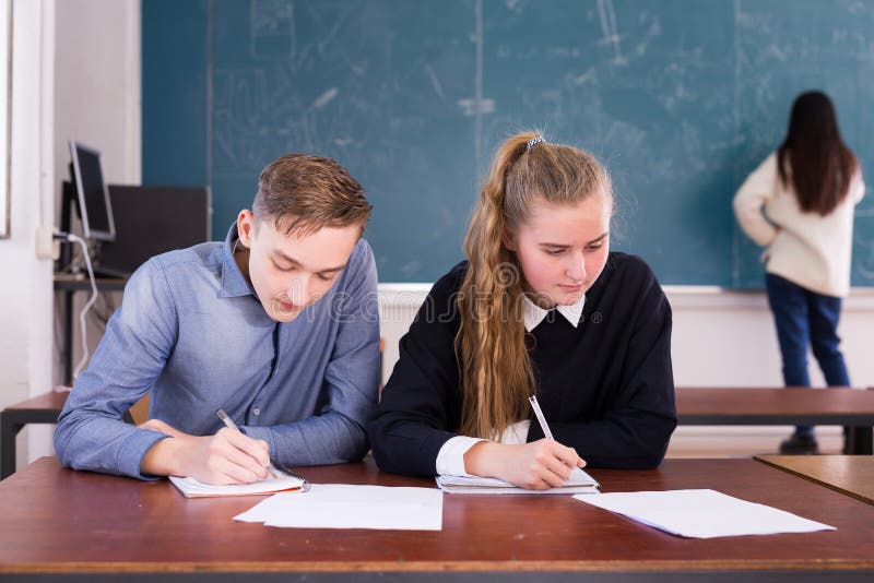 Two Students Studying in Classroom Stock Image - Image of lesson ...