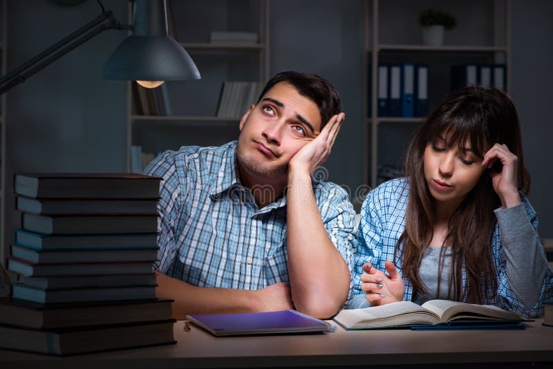 The Two Students Studying Late at Night Stock Photo - Image of graduate ...
