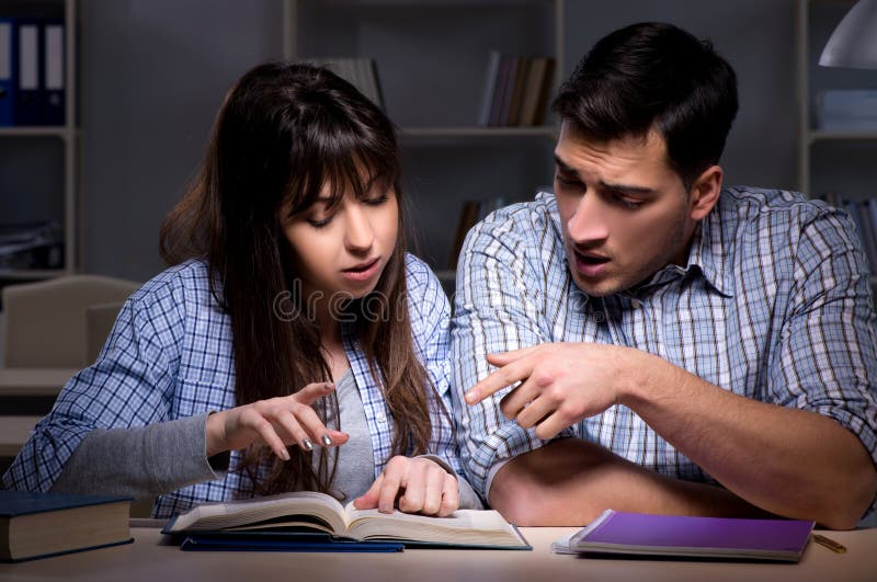 Two Students Studying Late at Night Stock Image - Image of homework ...