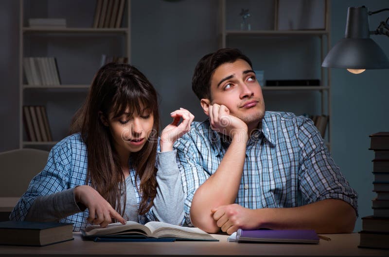 Two Students Studying Late at Night Stock Photo - Image of girl ...