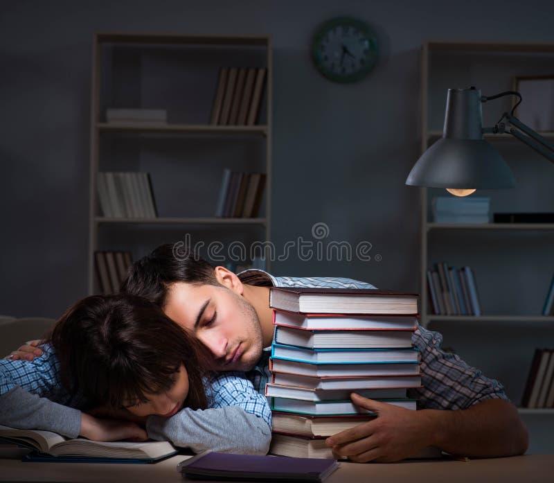 Two Students Studying Late at Night Stock Photo - Image of academic ...