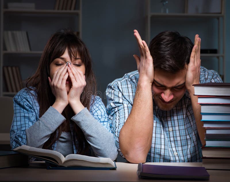 Two Students Studying Late at Night Stock Photo - Image of exams ...