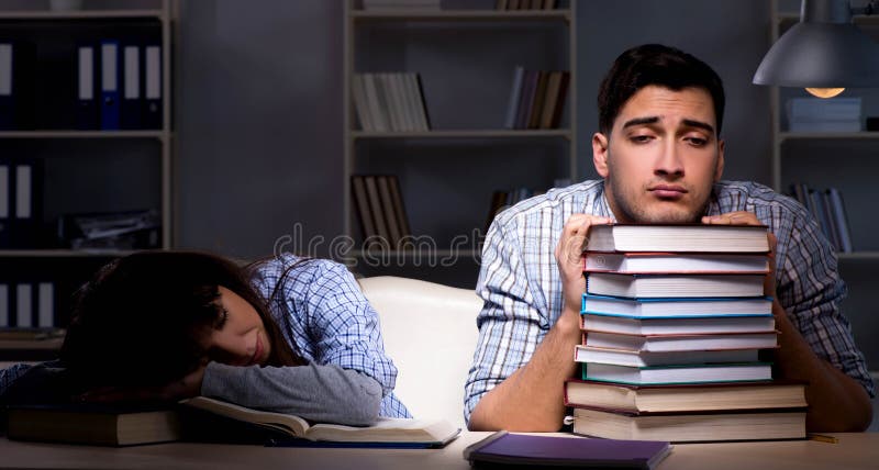 Two Students Studying Late at Night Stock Photo - Image of learning ...