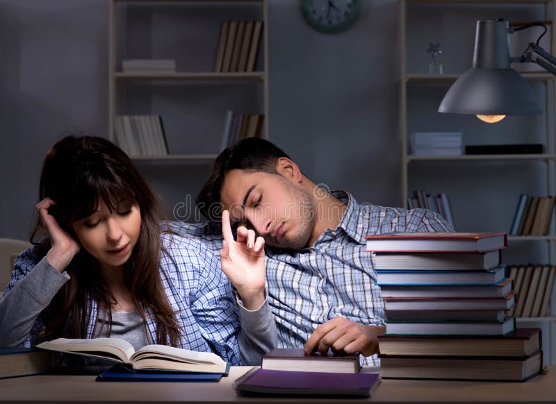 Two Students Studying Late at Night Stock Photo - Image of preparing ...