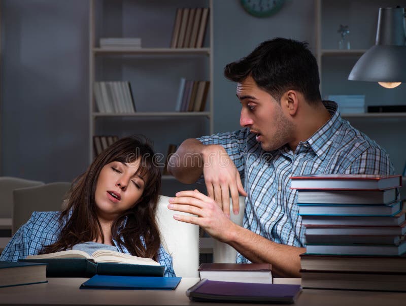 Two Students Studying Late at Night Stock Image - Image of book, back ...