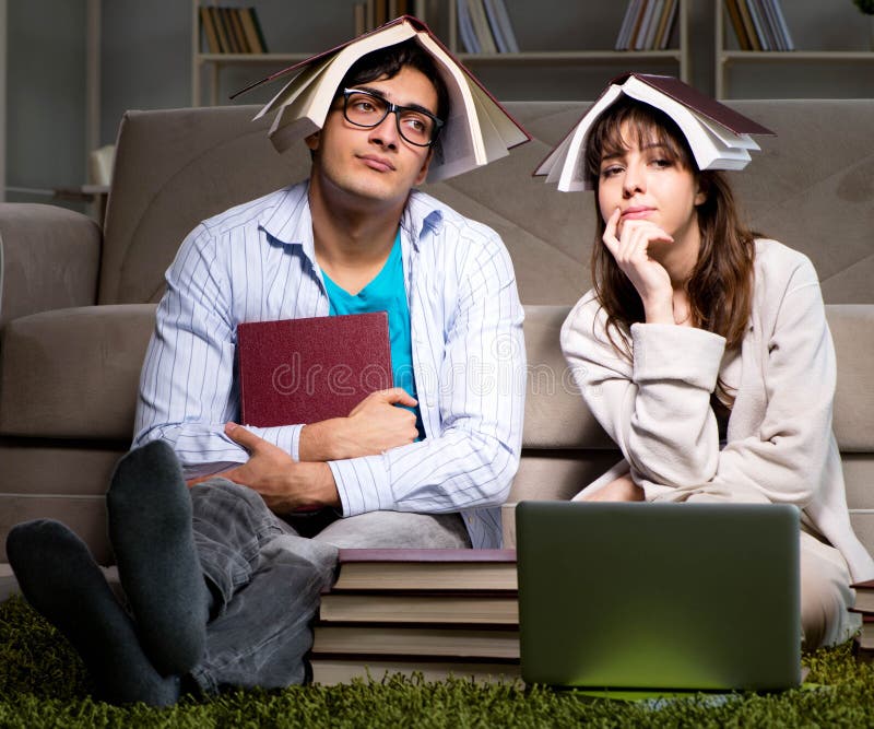 Two Students Studying Late Preparing for Exams Stock Image - Image of ...