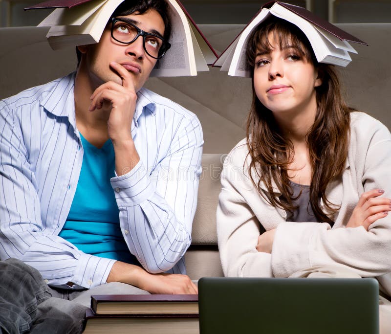 Two Students Studying Late Preparing for Exams Stock Image - Image of ...