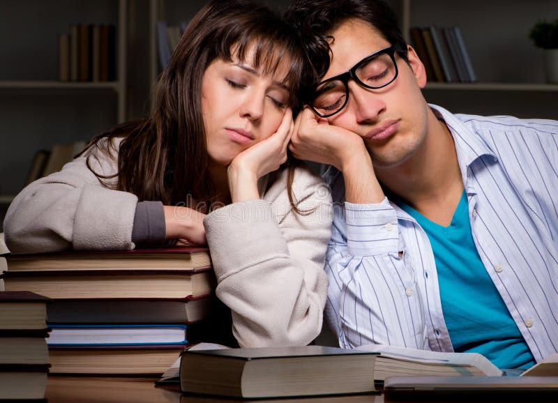 Two Students Studying Late Preparing for Exams Stock Photo - Image of ...
