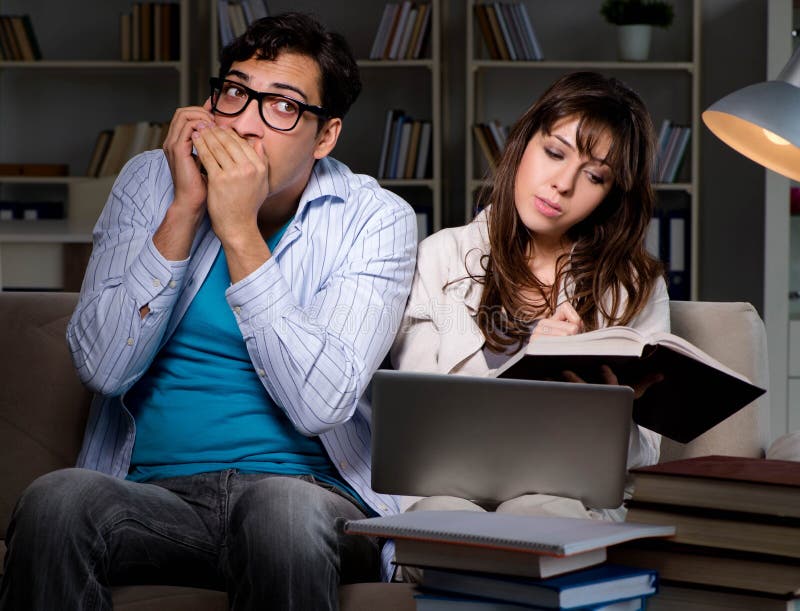 Two Students Studying Late Preparing for Exams Stock Photo - Image of ...