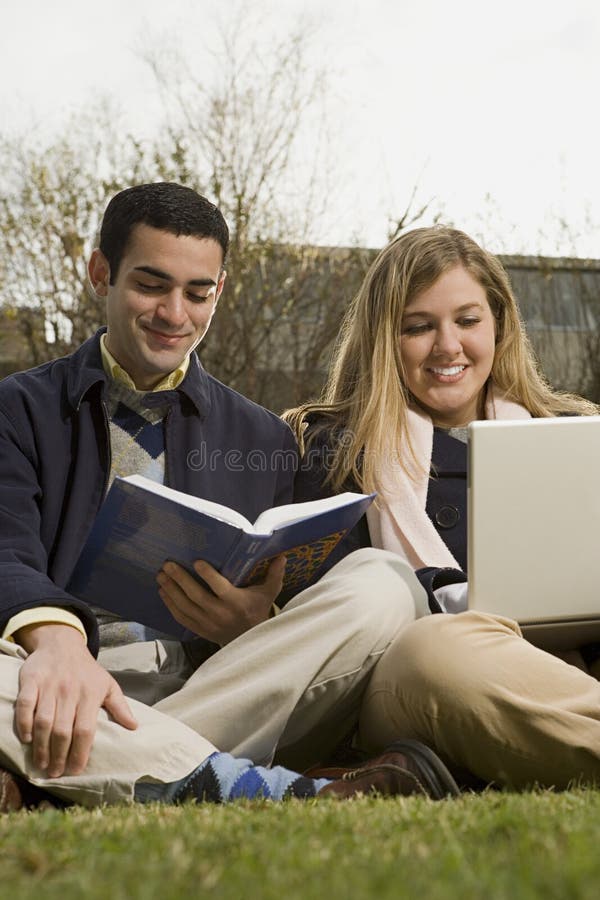 Two Students Studying Outdoors Stock Photo - Image of grass, lawn: 62810098