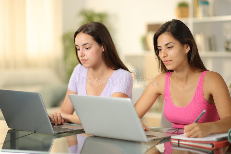 Two Students Studying Together at Home Stock Image - Image of computer ...