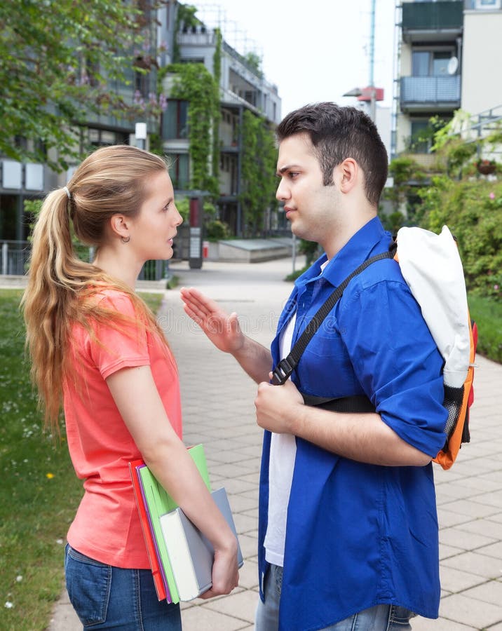 Two Students Talking on Campus Stock Photo - Image of couple, educate ...