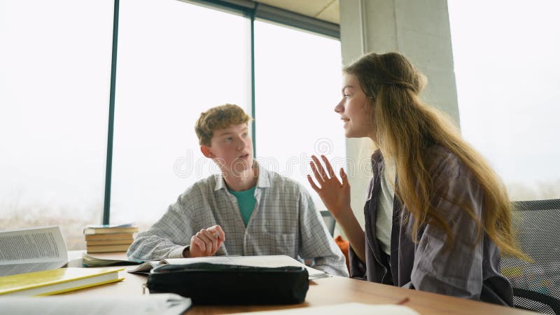 Two Students Talking in the Classroom during a Break Stock Video ...