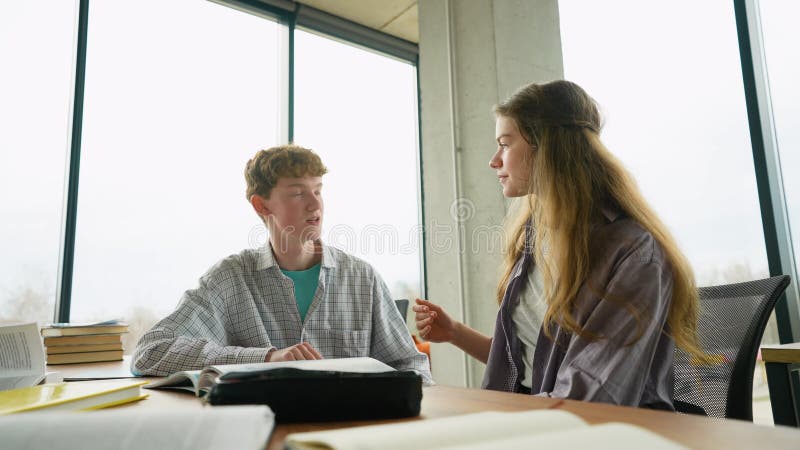 Two Students Talking in the Classroom during a Break Stock Video ...